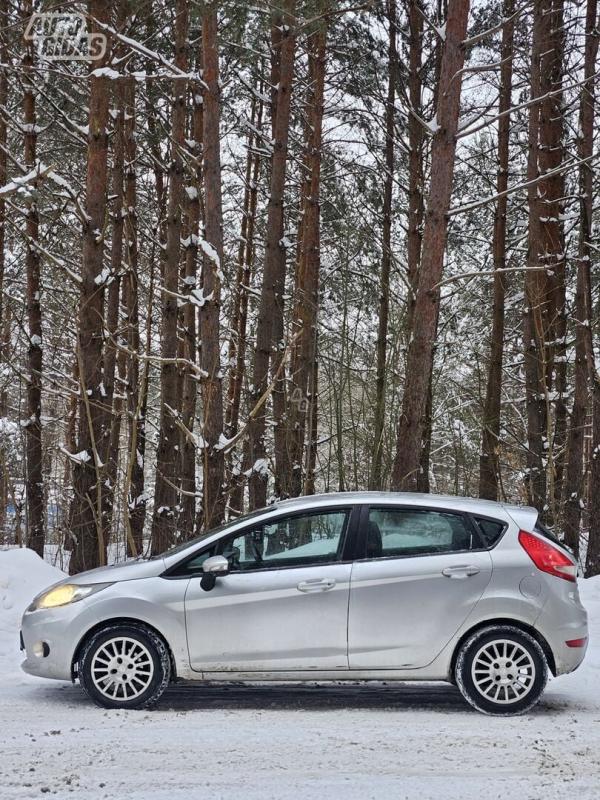 Grey Ford Fiesta 2010 in Vilnius, with an engine capacity of 1.40 L and mileage of 245 thousand km for 1600 €, photo 3 on AUTOMOTO.COM.LV