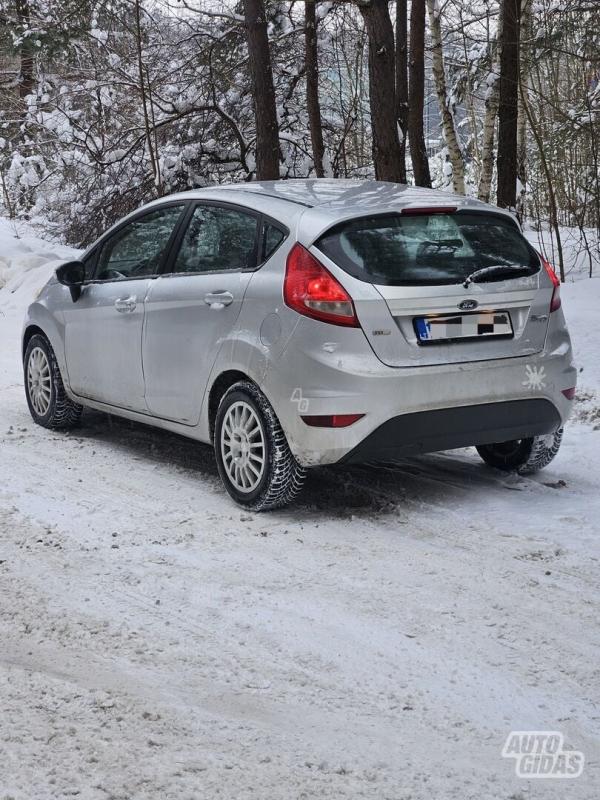 Grey Ford Fiesta 2010 in Vilnius, with an engine capacity of 1.40 L and mileage of 245 thousand km for 1600 €, photo 4 on AUTOMOTO.COM.LV