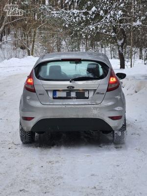 Grey Ford Fiesta 2010 in Vilnius, with an engine capacity of 1.40 L and mileage of 245 thousand km for 1600 €, photo 5 on AUTOMOTO.COM.LV