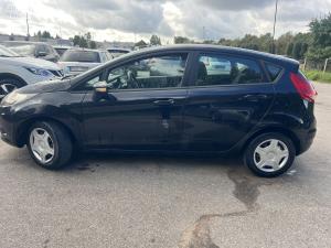 Grey Ford Fiesta 2010 in Siauliai, with an engine capacity of 1.20 L and mileage of 0 thousand km for 749 €, photo 9 on AUTOMOTO.COM.LV