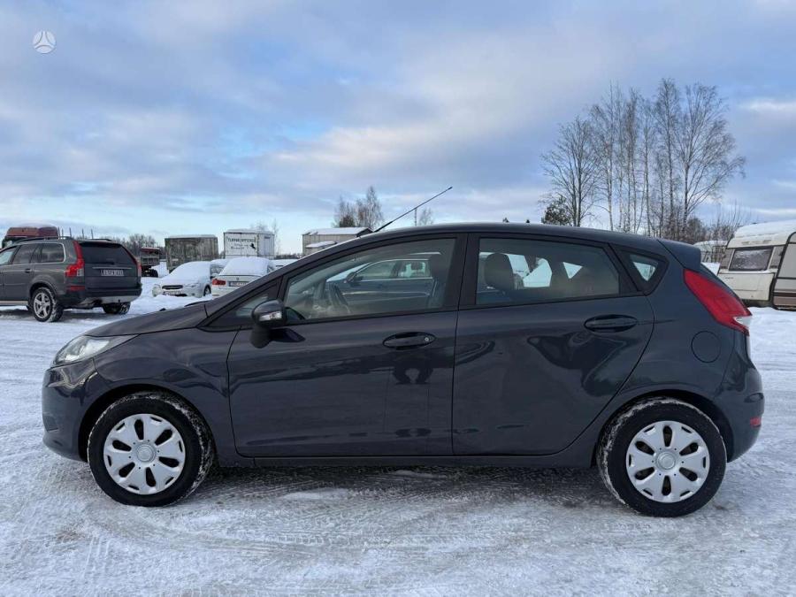 Grey Ford Fiesta 2011 in Utena, with an engine capacity of 1.40 L and mileage of 155 thousand km for 2100 €, photo 6 on AUTOMOTO.COM.LV