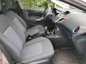Grey Ford Fiesta 2011 in Birzai, with an engine capacity of 1.40 L and mileage of 248 thousand km for 2100 €, photo 12 on AUTOMOTO.COM.LV