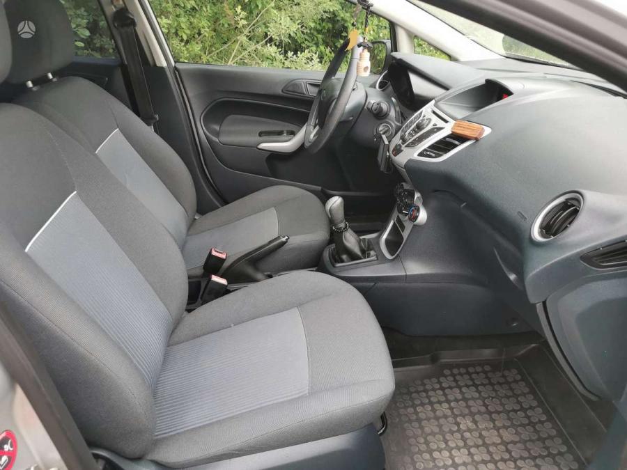 Grey Ford Fiesta 2011 in Birzai, with an engine capacity of 1.40 L and mileage of 248 thousand km for 2100 €, photo 12 on AUTOMOTO.COM.LV
