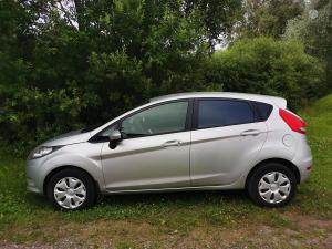 Grey Ford Fiesta 2011 in Birzai, with an engine capacity of 1.40 L and mileage of 248 thousand km for 2100 €, photo 15 on AUTOMOTO.COM.LV