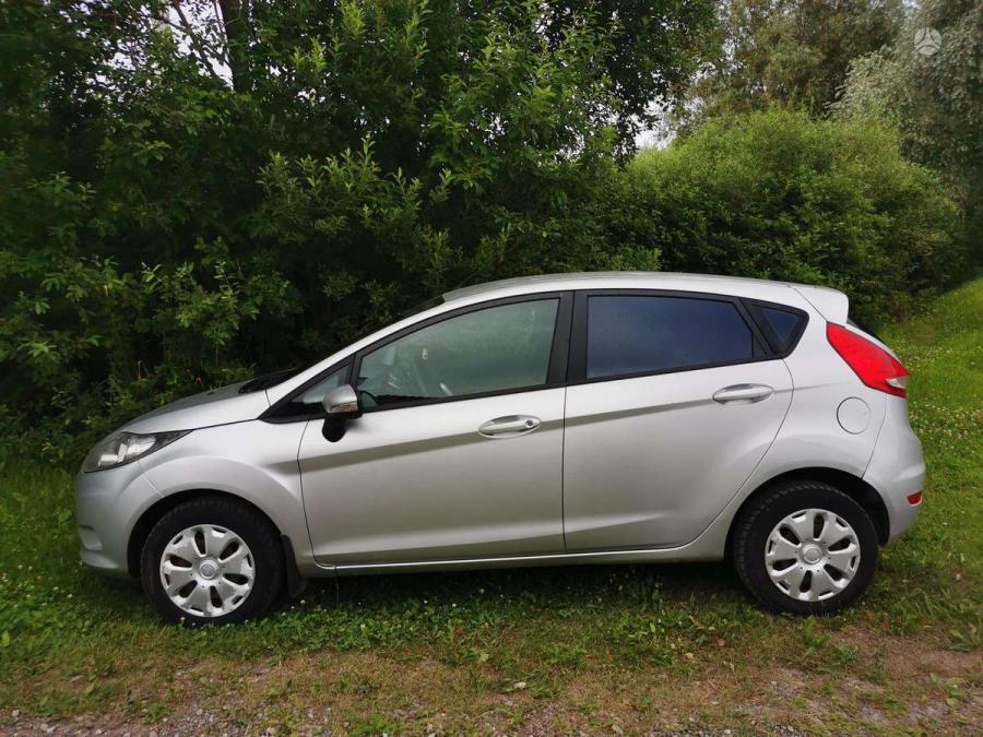 Grey Ford Fiesta 2011 in Birzai, with an engine capacity of 1.40 L and mileage of 248 thousand km for 2100 €, photo 15 on AUTOMOTO.COM.LV