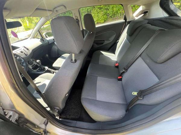 Grey Ford Fiesta 2011 in Trakai, with an engine capacity of 1.24 L and mileage of 190 thousand km for 2050 €, photo 3 on AUTOMOTO.COM.LV