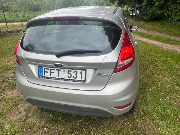 Grey Ford Fiesta 2011 in Trakai, with an engine capacity of 1.24 L and mileage of 190 thousand km for 2050 €, photo 10 on AUTOMOTO.COM.LV