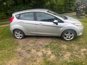 Pelēks Ford Fiesta 2011 Trakai, ar dzinēja tilpumu 1.24 L un nobraukumu 190 tūkst. km par 2050 €, foto 14 vietnē AUTOMOTO.COM.LV