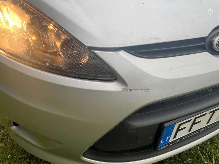Pelēks Ford Fiesta 2011 Trakai, ar dzinēja tilpumu 1.24 L un nobraukumu 190 tūkst. km par 2050 €, foto 16 vietnē AUTOMOTO.COM.LV