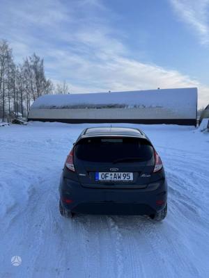 Grey Ford Fiesta 2013 in Panevezys, with an engine capacity of 1.56 L and mileage of 238 thousand km for 5100 €, photo 5 on AUTOMOTO.COM.LV
