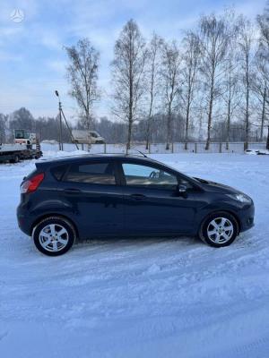 Grey Ford Fiesta 2013 in Panevezys, with an engine capacity of 1.56 L and mileage of 238 thousand km for 5100 €, photo 7 on AUTOMOTO.COM.LV