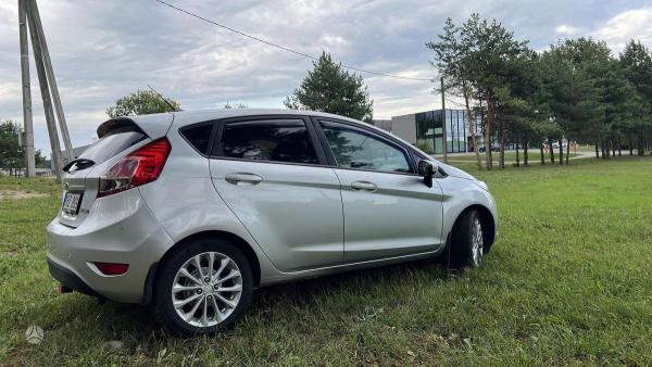 Grey Ford Fiesta 2014 in Kaunas, with an engine capacity of 1.60 L and mileage of 156 thousand km for 4955 €, photo 4 on AUTOMOTO.COM.LV