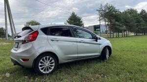 Grey Ford Fiesta 2014 in Kaunas, with an engine capacity of 1.60 L and mileage of 156 thousand km for 4955 €, photo 5 on AUTOMOTO.COM.LV