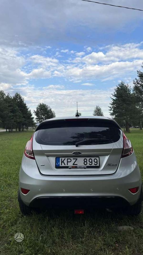 Grey Ford Fiesta 2014 in Kaunas, with an engine capacity of 1.60 L and mileage of 156 thousand km for 4955 €, photo 6 on AUTOMOTO.COM.LV