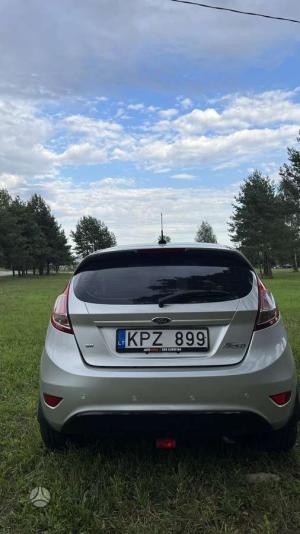 Grey Ford Fiesta 2014 in Kaunas, with an engine capacity of 1.60 L and mileage of 156 thousand km for 4955 €, photo 7 on AUTOMOTO.COM.LV