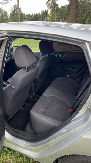 Grey Ford Fiesta 2014 in Kaunas, with an engine capacity of 1.60 L and mileage of 156 thousand km for 4955 €, photo 18 on AUTOMOTO.COM.LV