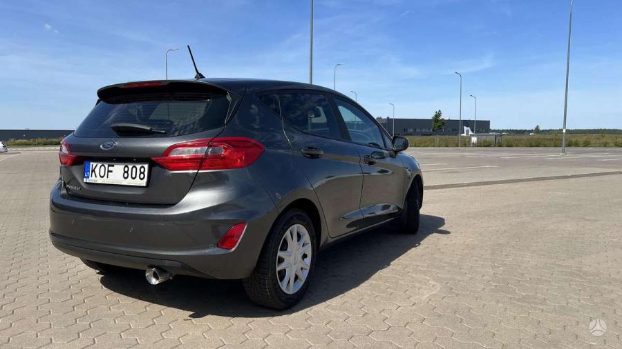 Grey Ford Fiesta 2018 in Kaunas, with an engine capacity of 1.00 L and mileage of 160 thousand km for 4998 €, photo 6 on AUTOMOTO.COM.LV