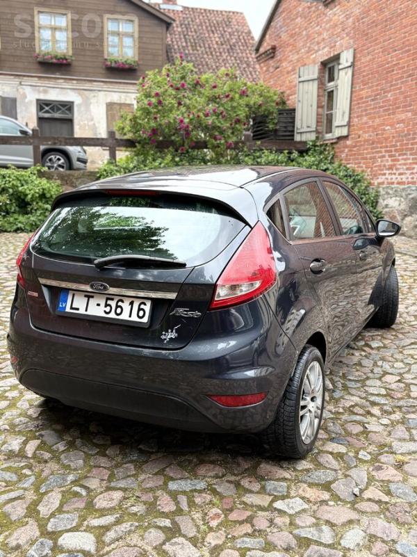 Grey Ford Fiesta 2011 in Kuldiga, with an engine capacity of 1.40 L and mileage of 0 thousand km for 2250 €, photo 8 on AUTOMOTO.COM.LV