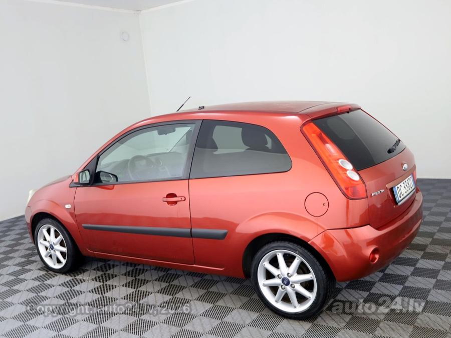 Orange Ford Fiesta 2006 in Tallinn, with an engine capacity of 1.40 L and mileage of 117 thousand km for 499 €, photo 5 on AUTOMOTO.COM.LV