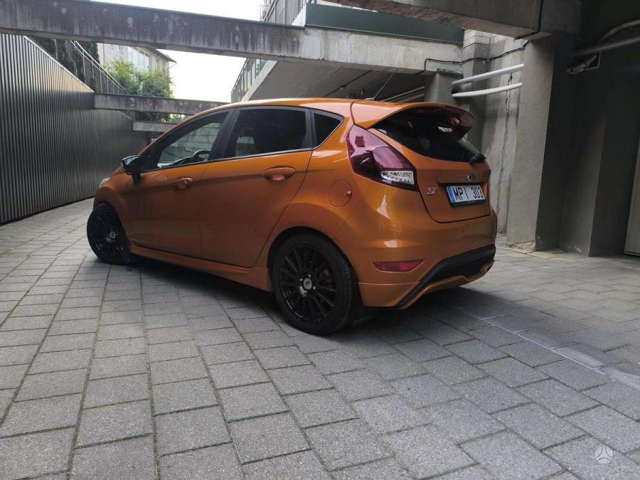 Oranžs Ford Fiesta 2017 Viļņa, ar dzinēja tilpumu 1.60 L un nobraukumu 150 tūkst. km par 8500 €, foto 7 vietnē AUTOMOTO.COM.LV