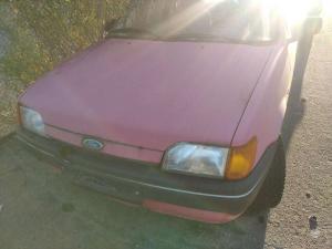 Red Ford Fiesta 1991 in Panevezys, with an engine capacity of 1.12 L and mileage of 222 thousand km for 265 €, photo  on AUTOMOTO.COM.LV