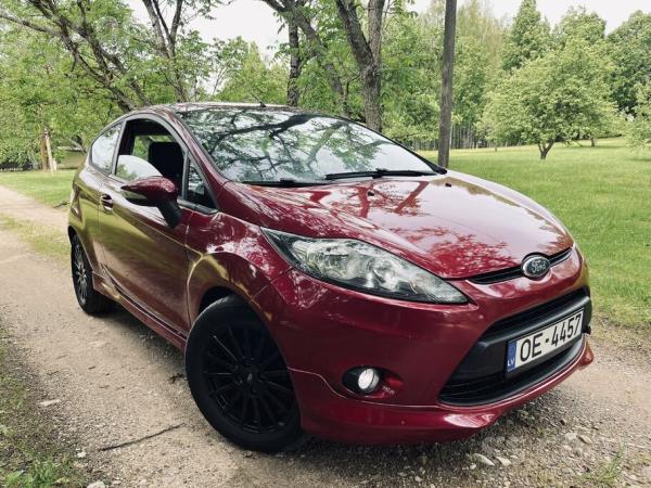 Red Ford Fiesta 2008 in Cesis, with an engine capacity of 1.20 L and mileage of 210 thousand km for 3000 €, photo 2 on AUTOMOTO.COM.LV