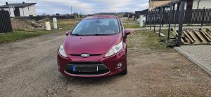 Sarkans Ford Fiesta 2009 Klaipėda, ar dzinēja tilpumu 1.24 L un nobraukumu 178 tūkst. km par 2100 €, foto  vietnē AUTOMOTO.COM.LV