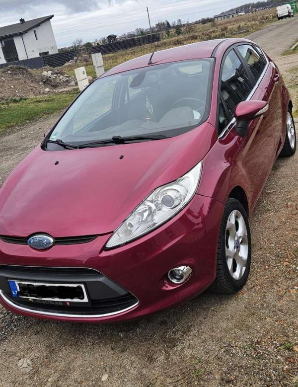 Red Ford Fiesta 2009 in Klaipeda, with an engine capacity of 1.24 L and mileage of 178 thousand km for 2100 €, photo 8 on AUTOMOTO.COM.LV