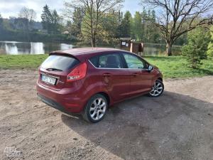 Red Ford Fiesta 2009 in Raseiniai, with an engine capacity of 1.60 L and mileage of 201 thousand km for 1700 €, photo 4 on AUTOMOTO.COM.LV