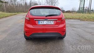 Red Ford Fiesta 2009 in Ogre, with an engine capacity of 1.30 L and mileage of 180 thousand km for 2399 €, photo 5 on AUTOMOTO.COM.LV