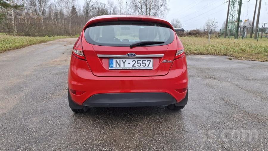 Red Ford Fiesta 2009 in Ogre, with an engine capacity of 1.30 L and mileage of 180 thousand km for 2399 €, photo 5 on AUTOMOTO.COM.LV