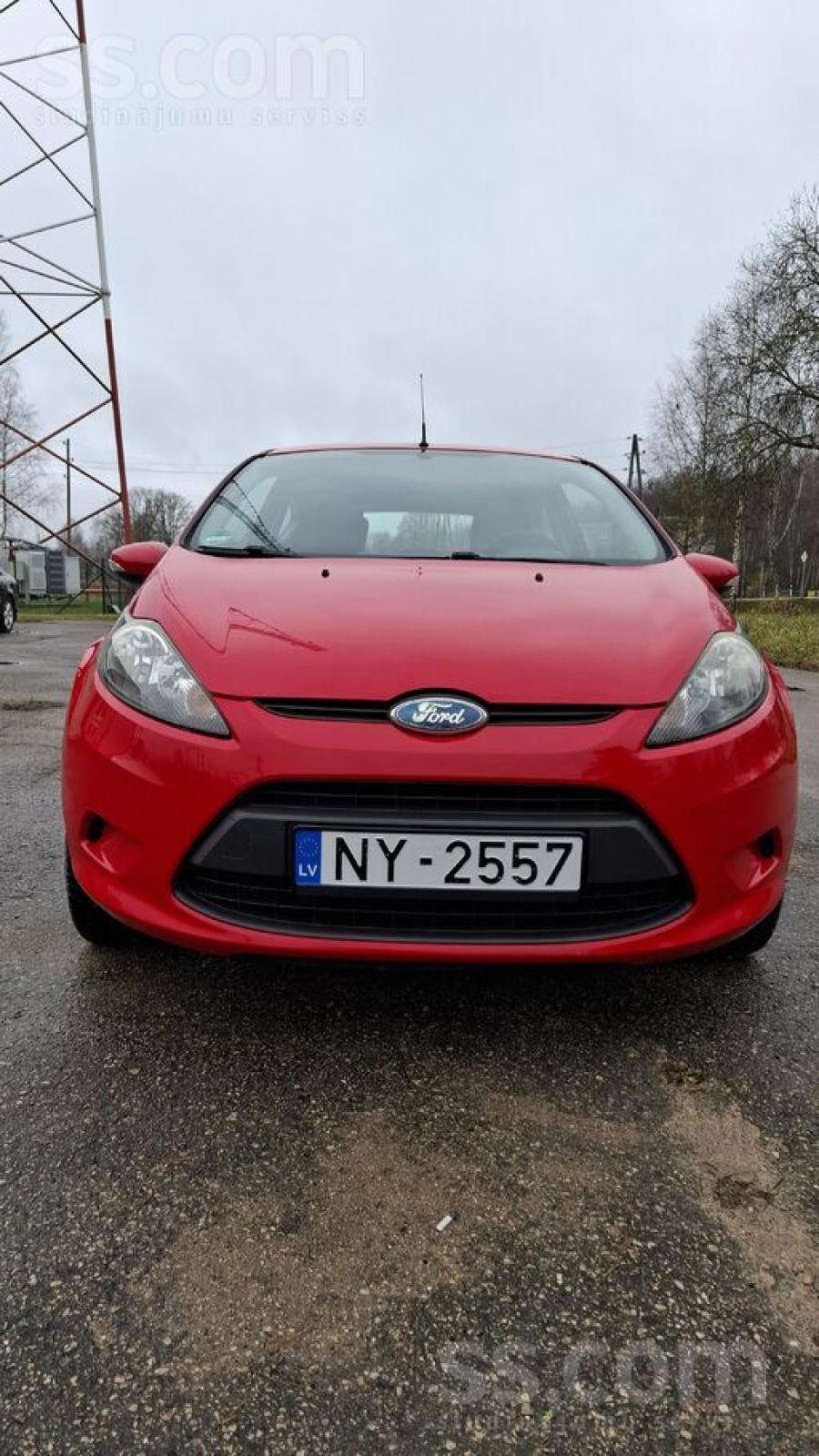 Red Ford Fiesta 2009 in Ogre, with an engine capacity of 1.30 L and mileage of 180 thousand km for 2399 €, photo 8 on AUTOMOTO.COM.LV