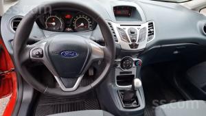 Red Ford Fiesta 2009 in Ogre, with an engine capacity of 1.30 L and mileage of 180 thousand km for 2399 €, photo 12 on AUTOMOTO.COM.LV