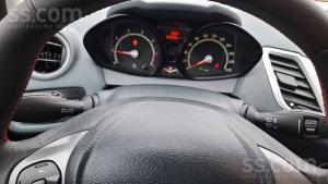Red Ford Fiesta 2009 in Ogre, with an engine capacity of 1.30 L and mileage of 180 thousand km for 2399 €, photo 19 on AUTOMOTO.COM.LV