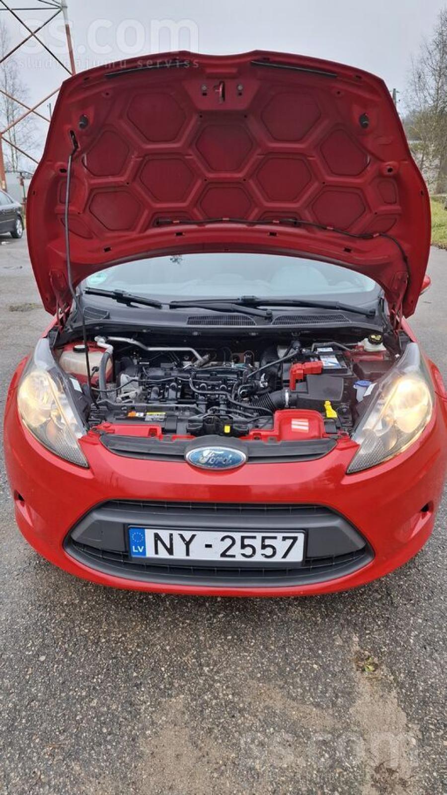 Red Ford Fiesta 2009 in Ogre, with an engine capacity of 1.30 L and mileage of 180 thousand km for 2399 €, photo 20 on AUTOMOTO.COM.LV