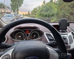 Red Ford Fiesta 2009 in Riga, with an engine capacity of 1.20 L and mileage of 236 thousand km for 1200 €, photo 10 on AUTOMOTO.COM.LV