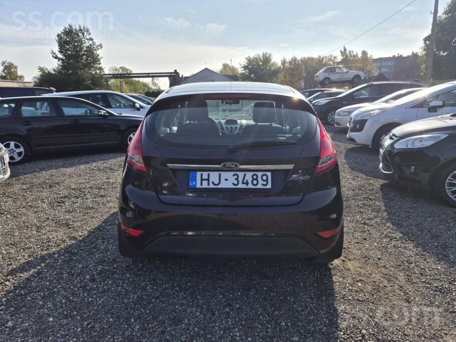 Red Ford Fiesta 2009 in Daugavpils, with an engine capacity of 1.40 L and mileage of 0 thousand km for 4300 €, photo 6 on AUTOMOTO.COM.LV