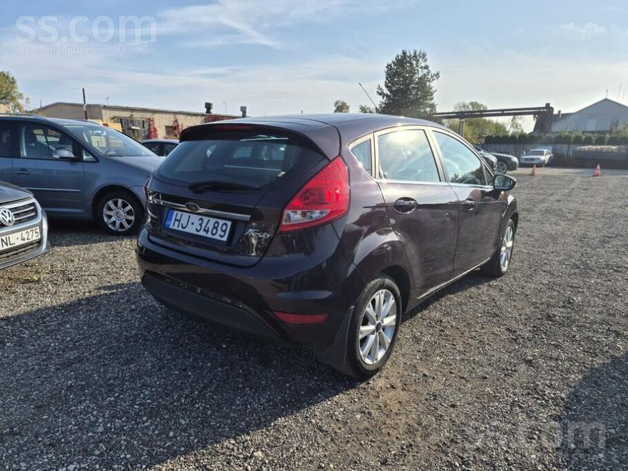 Red Ford Fiesta 2009 in Daugavpils, with an engine capacity of 1.40 L and mileage of 0 thousand km for 4300 €, photo 7 on AUTOMOTO.COM.LV