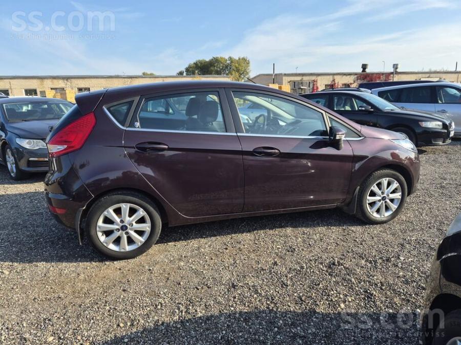 Red Ford Fiesta 2009 in Daugavpils, with an engine capacity of 1.40 L and mileage of 0 thousand km for 4300 €, photo 9 on AUTOMOTO.COM.LV