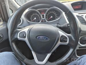 Red Ford Fiesta 2009 in Daugavpils, with an engine capacity of 1.40 L and mileage of 0 thousand km for 4300 €, photo 12 on AUTOMOTO.COM.LV