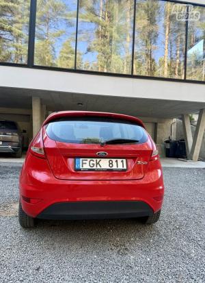 Sarkans Ford Fiesta 2011 Viļņa, ar dzinēja tilpumu 1.20 L un nobraukumu 176 tūkst. km par 1400 €, foto 6 vietnē AUTOMOTO.COM.LV