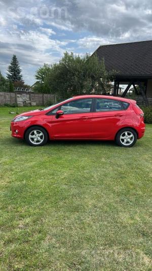 Red Ford Fiesta 2011 in Riga, with an engine capacity of 1.60 L and mileage of 172 thousand km for 2300 €, photo 4 on AUTOMOTO.COM.LV