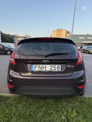 Red Ford Fiesta 2011 in Vilnius, with an engine capacity of 1.24 L and mileage of 176 thousand km for 1000 €, photo 6 on AUTOMOTO.COM.LV