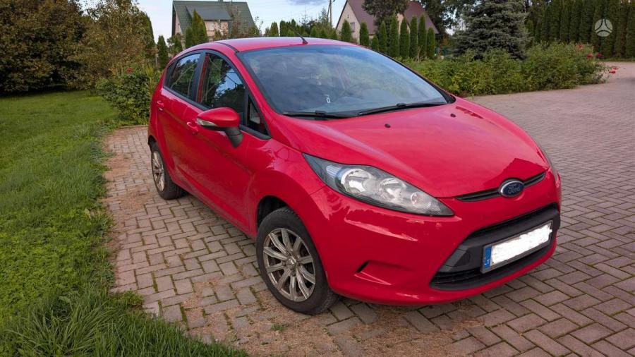 Red Ford Fiesta 2011 in Kaunas, with an engine capacity of 1.40 L and mileage of 298 thousand km for 2200 €, photo 3 on AUTOMOTO.COM.LV