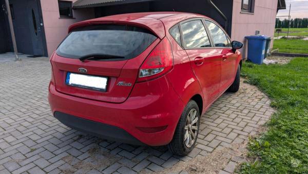 Red Ford Fiesta 2011 in Kaunas, with an engine capacity of 1.40 L and mileage of 298 thousand km for 2200 €, photo 4 on AUTOMOTO.COM.LV
