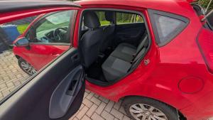 Red Ford Fiesta 2011 in Kaunas, with an engine capacity of 1.40 L and mileage of 298 thousand km for 2200 €, photo 8 on AUTOMOTO.COM.LV