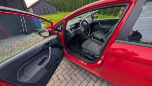 Red Ford Fiesta 2011 in Kaunas, with an engine capacity of 1.40 L and mileage of 298 thousand km for 2200 €, photo 10 on AUTOMOTO.COM.LV