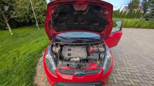 Red Ford Fiesta 2011 in Kaunas, with an engine capacity of 1.40 L and mileage of 298 thousand km for 2200 €, photo 12 on AUTOMOTO.COM.LV