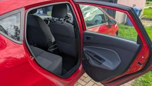 Red Ford Fiesta 2011 in Kaunas, with an engine capacity of 1.40 L and mileage of 298 thousand km for 2200 €, photo 16 on AUTOMOTO.COM.LV