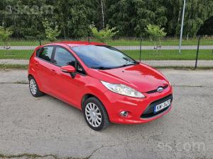Sarkans Ford Fiesta 2012 Rīga, ar dzinēja tilpumu 1.40 L un nobraukumu 84 tūkst. km par 3700 €, foto  vietnē AUTOMOTO.COM.LV